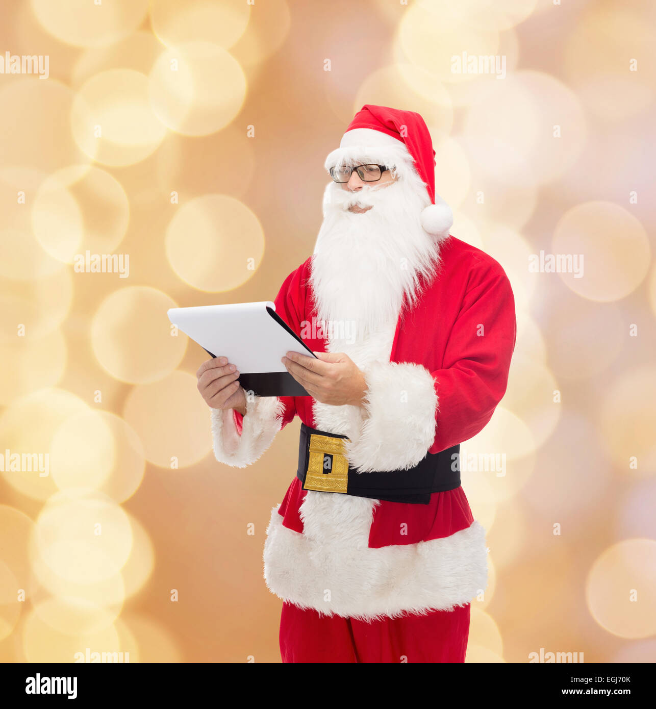 man in costume of santa claus with notepad Stock Photo - Alamy