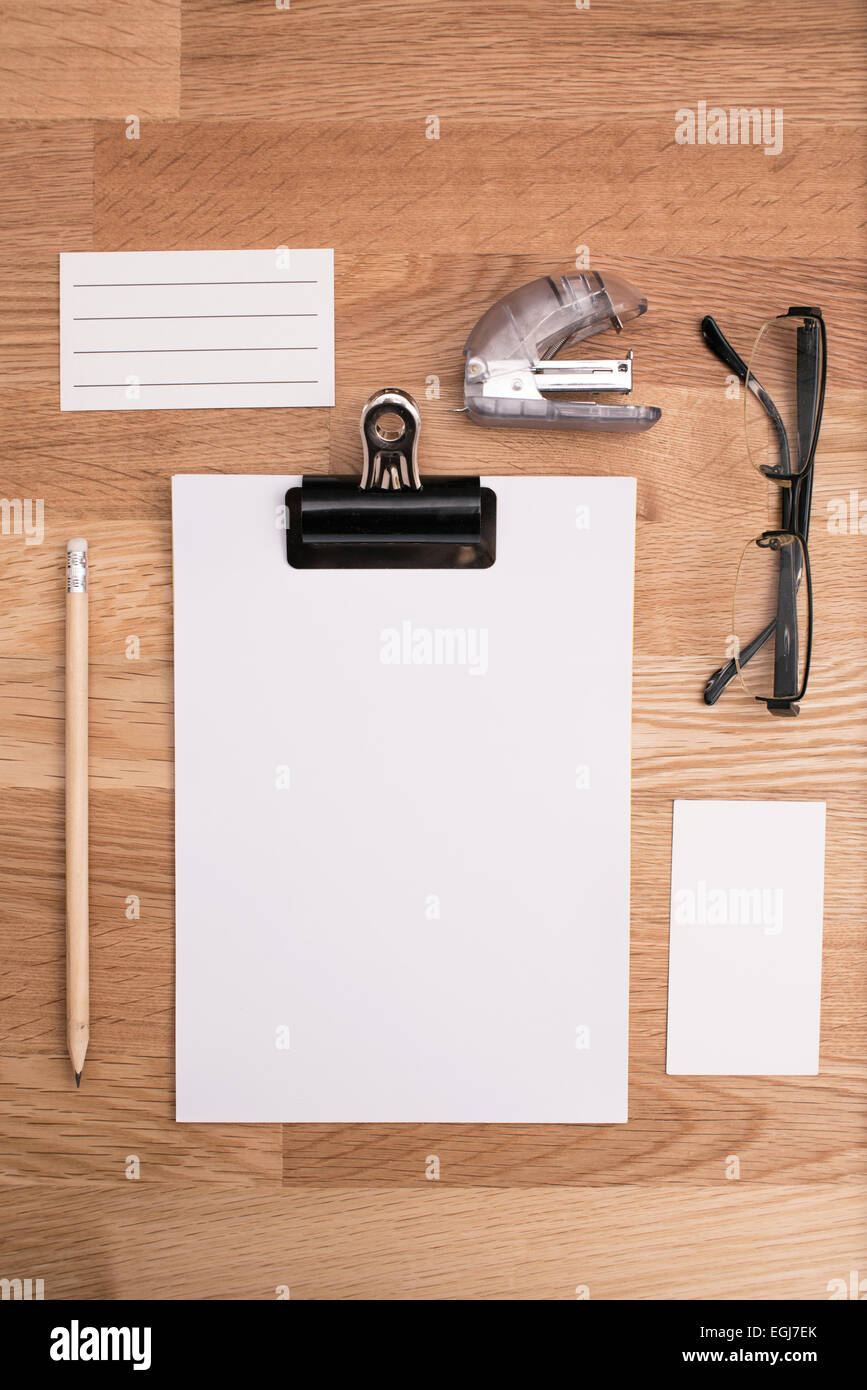 Blank paper on the office table Stock Photo - Alamy