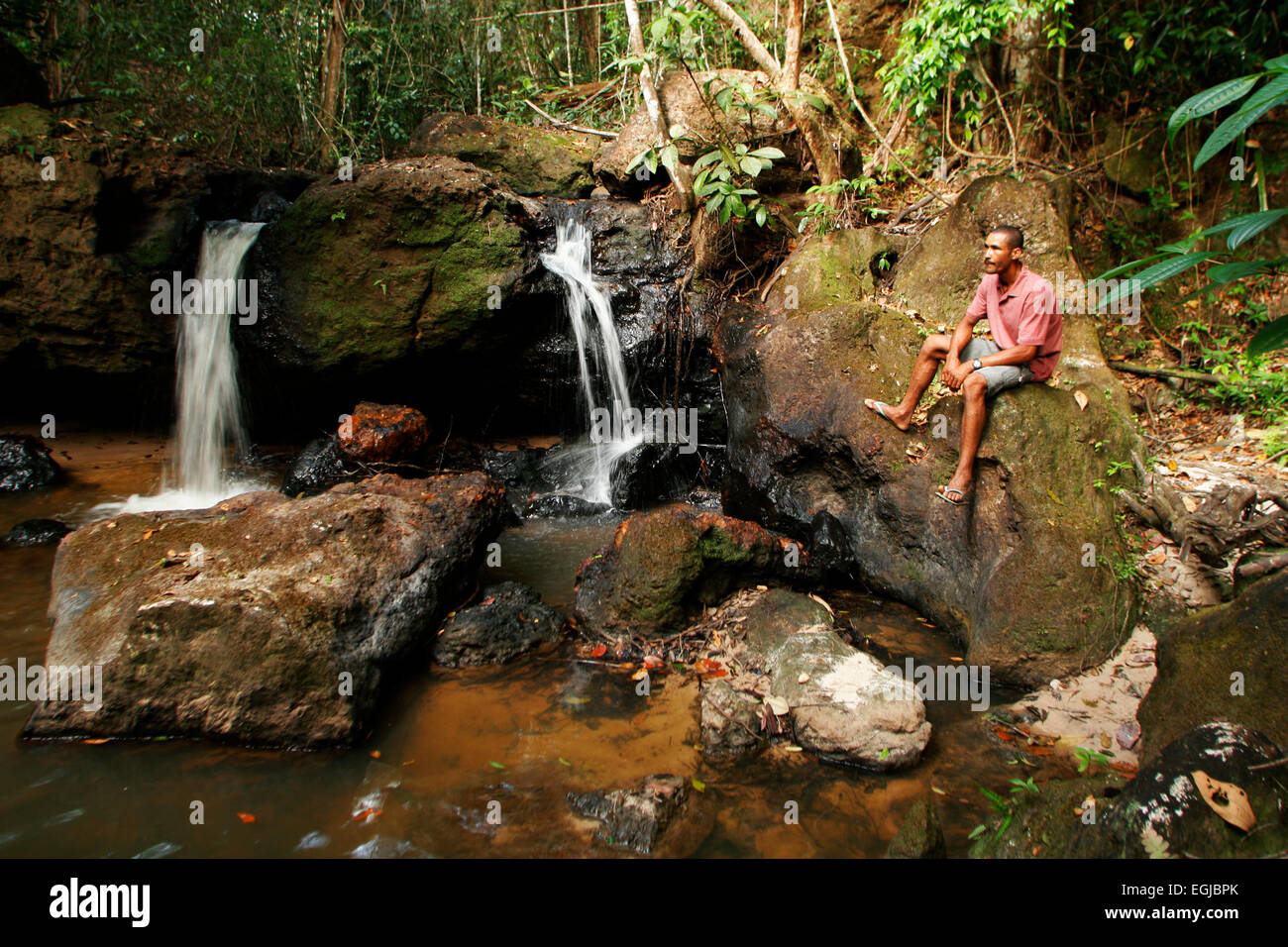 Sitting by waterfall hi-res stock photography and images - Alamy