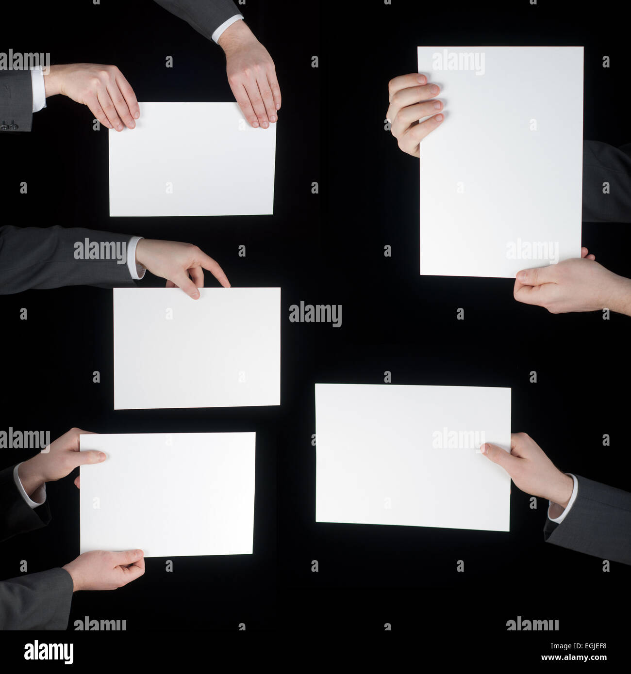 collection of hand holding blank paper on black Stock Photo - Alamy