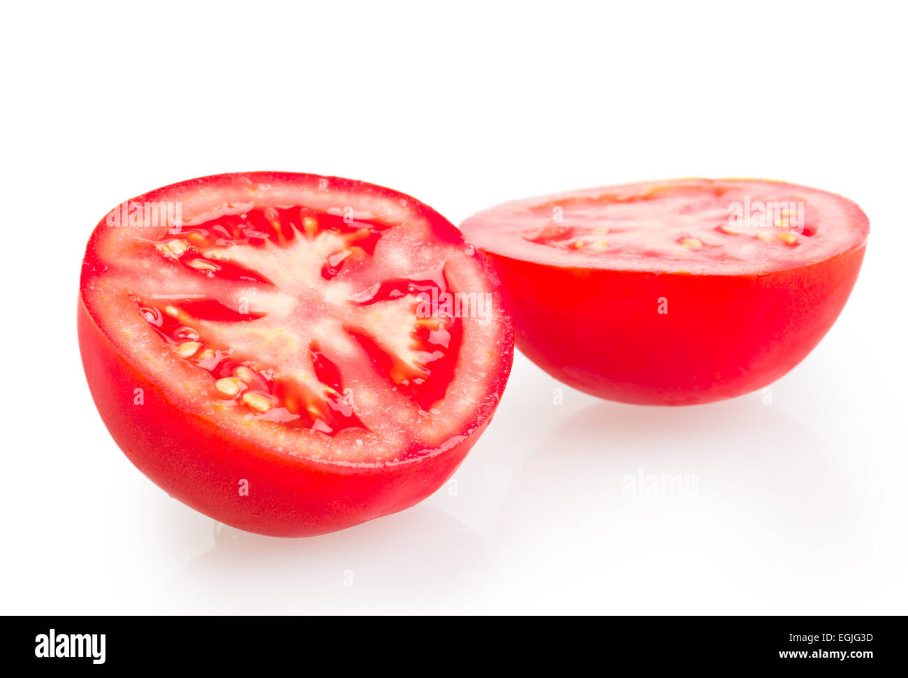 chopped tomato isolated on white background Stock Photo - Alamy