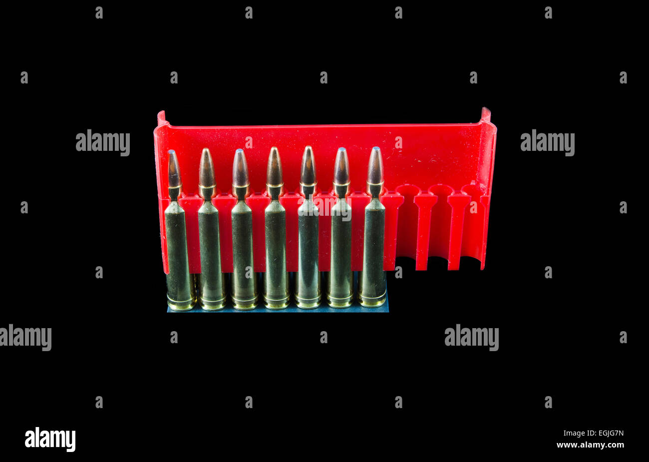 Red plastic cartridge holder for twenty arm cartridges with tree ...