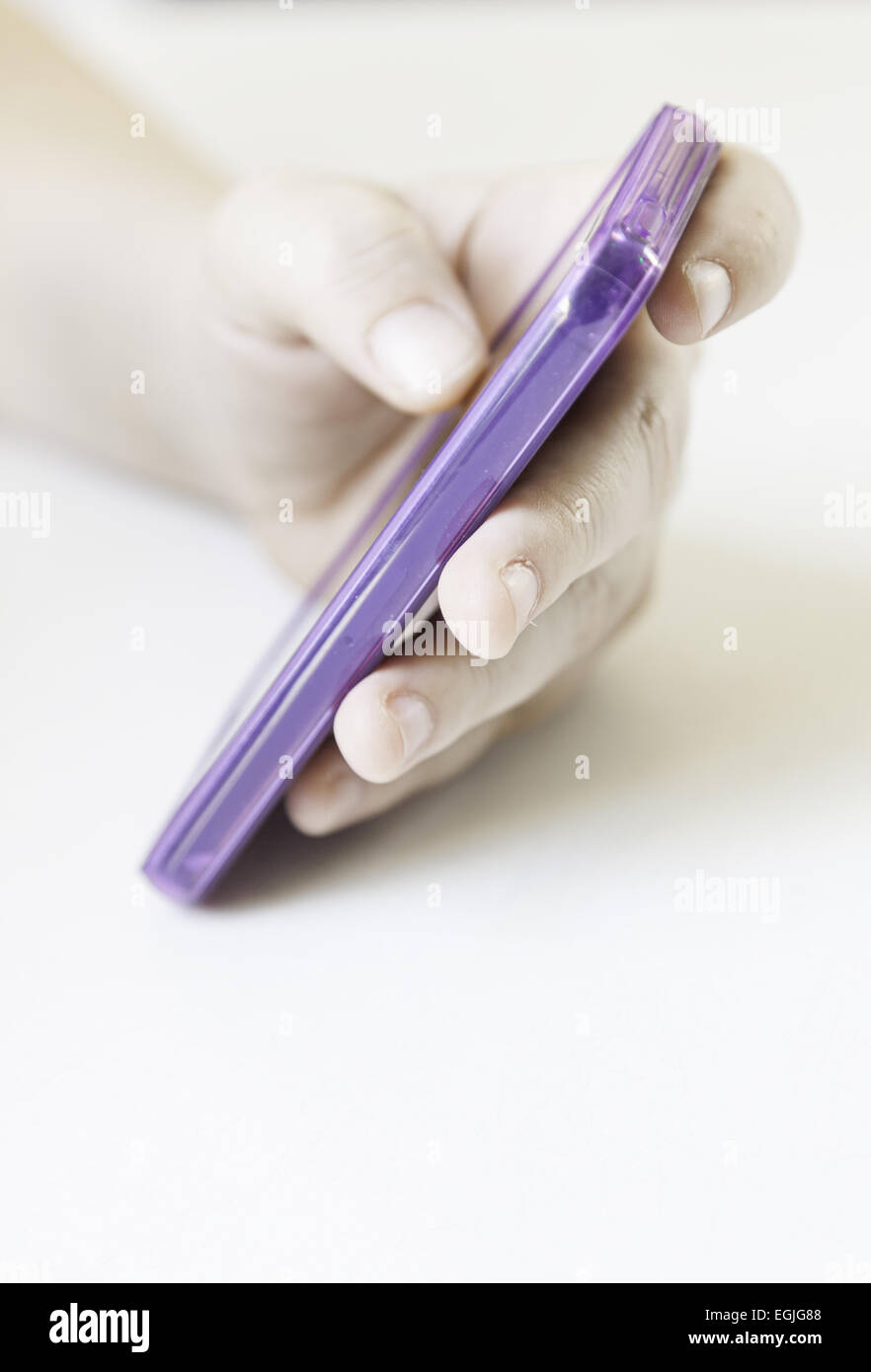 Using mobile phone, detail of a hand using a mobile phone the latest ...
