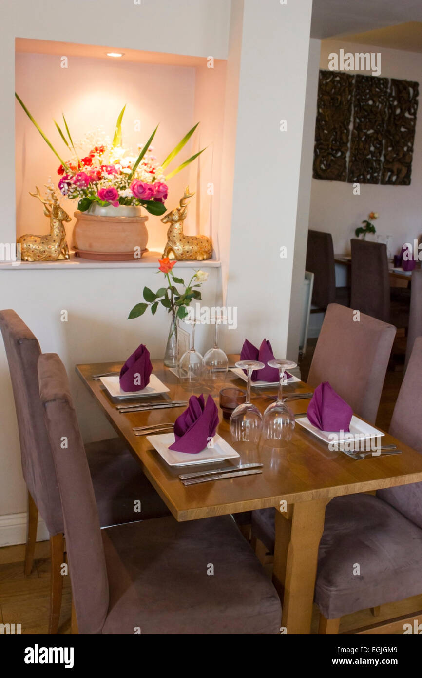 Thai Restaurant interior tables and flowers Stock Photo - Alamy