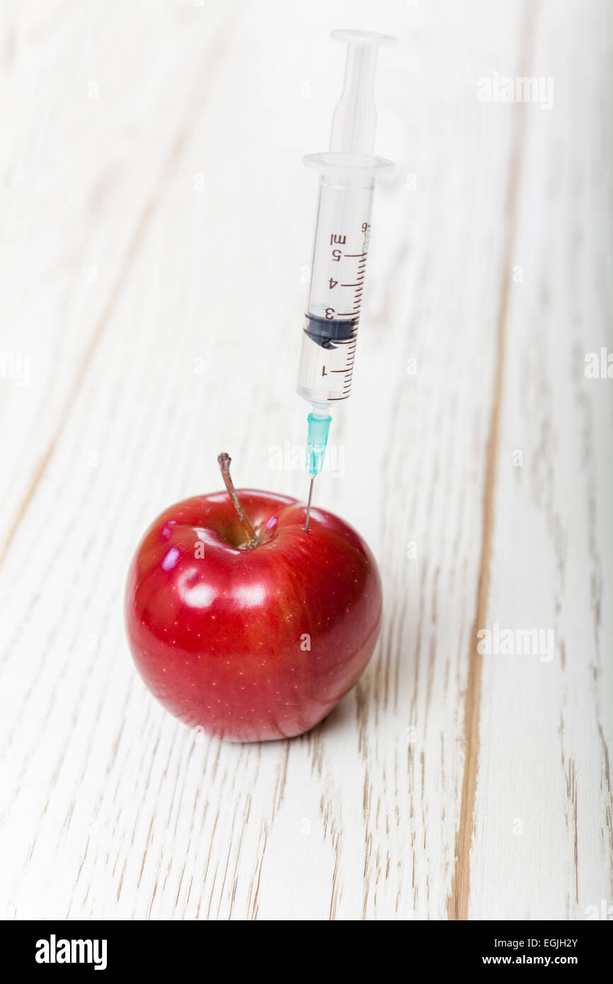Science experiment with apple and syringe Stock Photo - Alamy