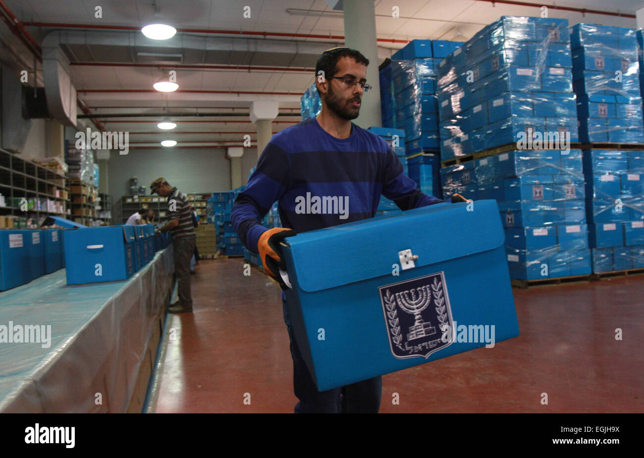Jerusalem. 25th Feb, 2015. An Israeli electoral employee carries a ...