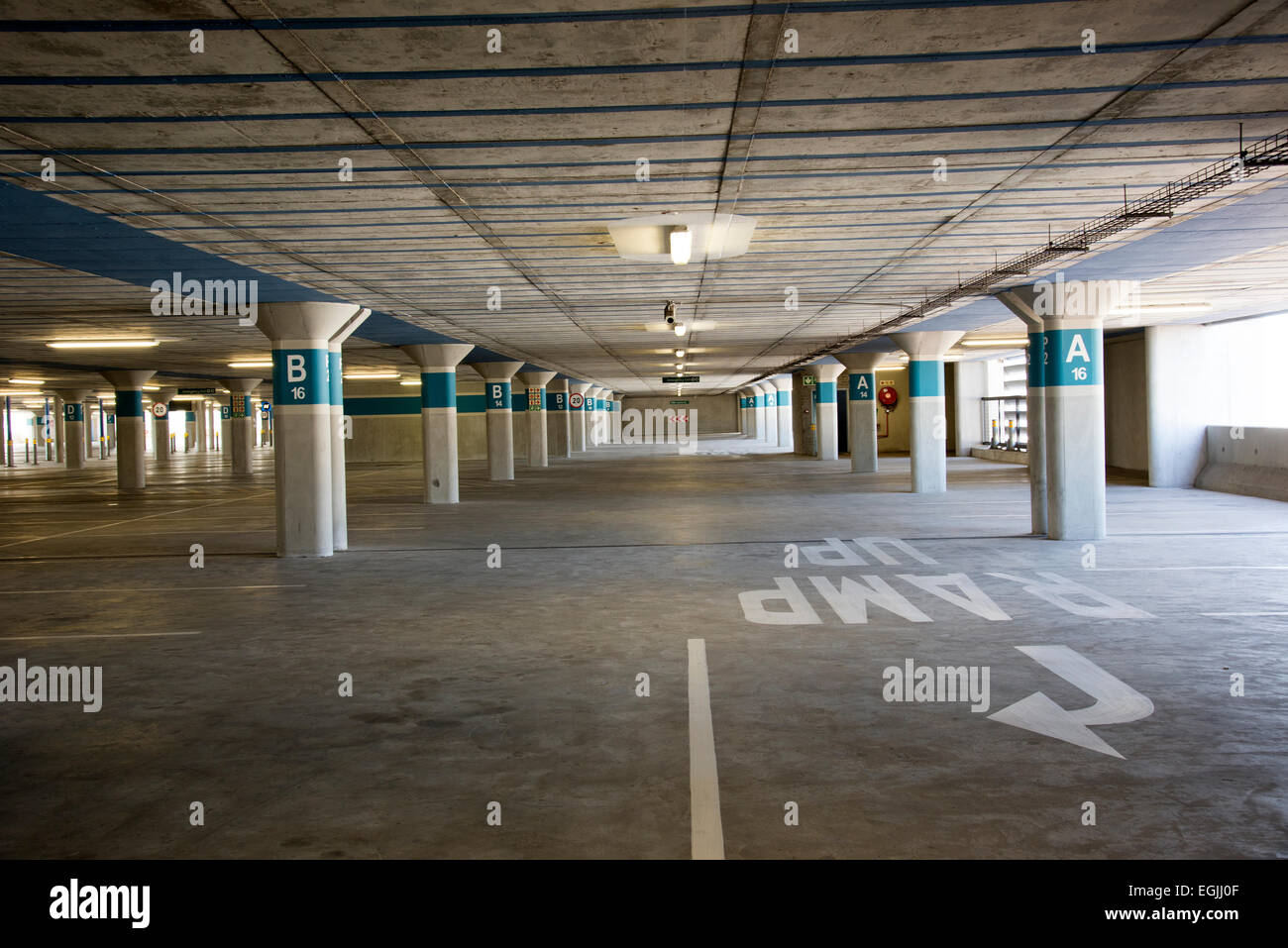 Empty spaces in a multistory car park building Stock Photo - Alamy