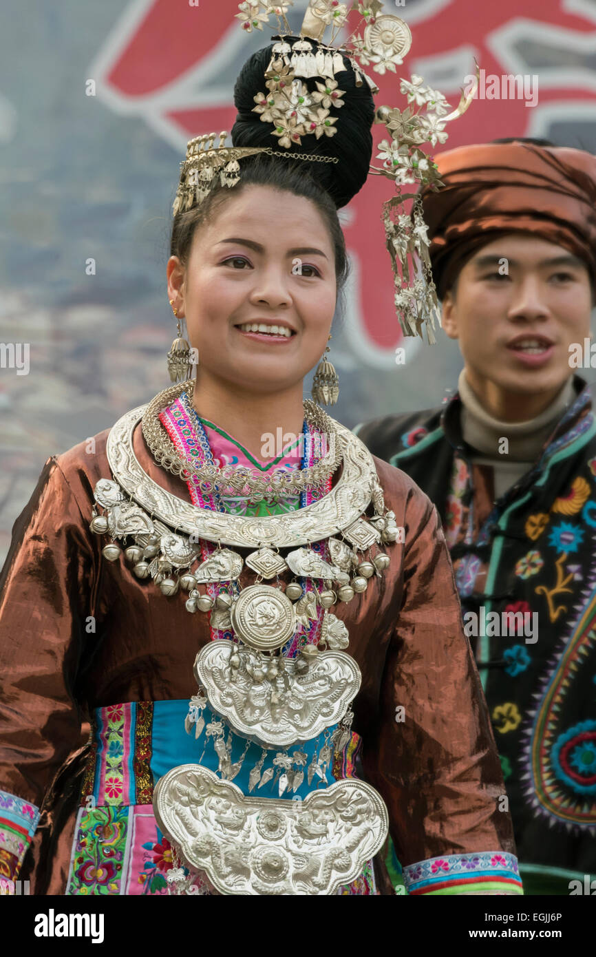 Portrait of a Dong woman and man in traditional attire, Zhaoxing Dong ...
