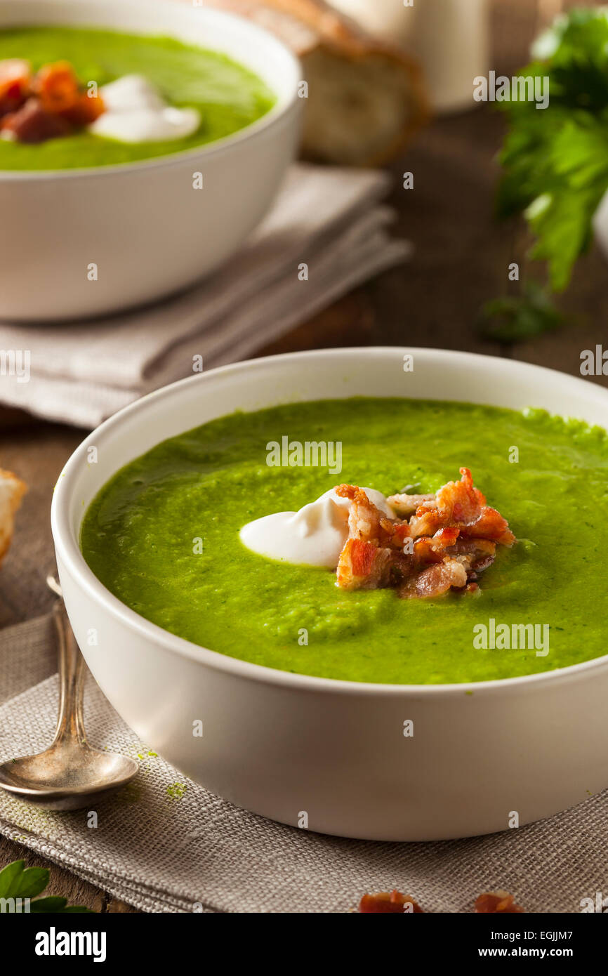Homemade Green Spring Pea Soup with Cream and Bacon Stock Photo - Alamy