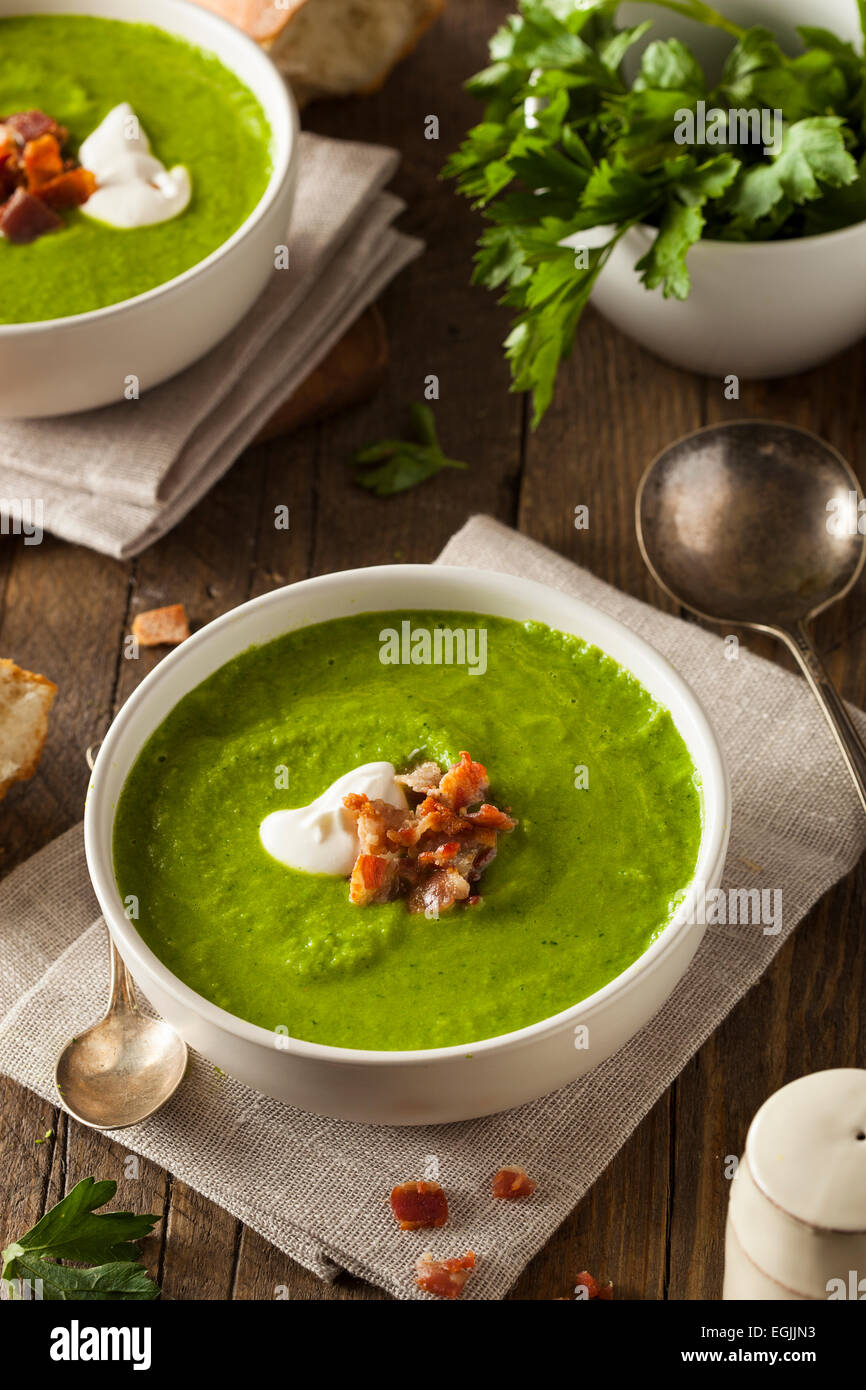 Homemade Green Spring Pea Soup with Cream and Bacon Stock Photo - Alamy