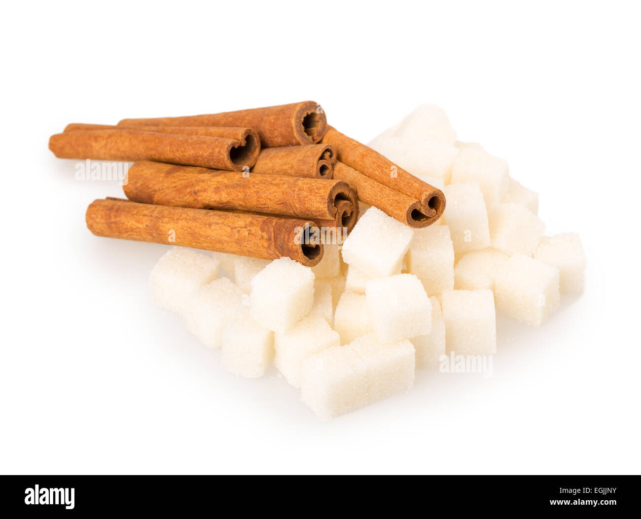 cubes of sugar and cinnamon isolated on white background Stock Photo ...