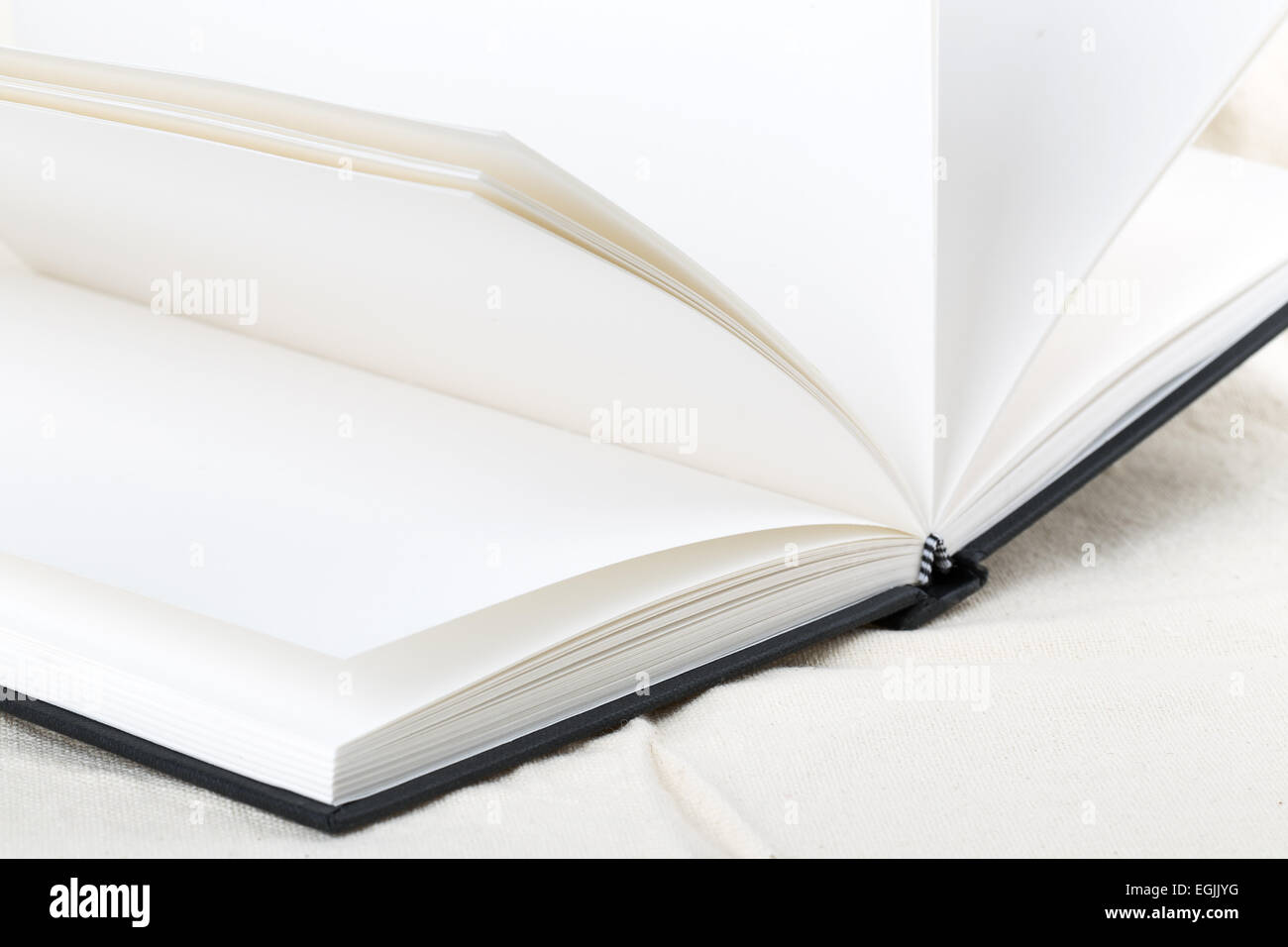 open book isolated on white background Stock Photo - Alamy
