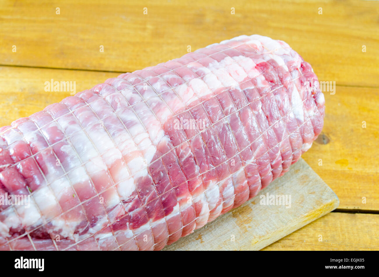 Raw meatloaf on a cutting board, ready for roasting Stock Photo - Alamy