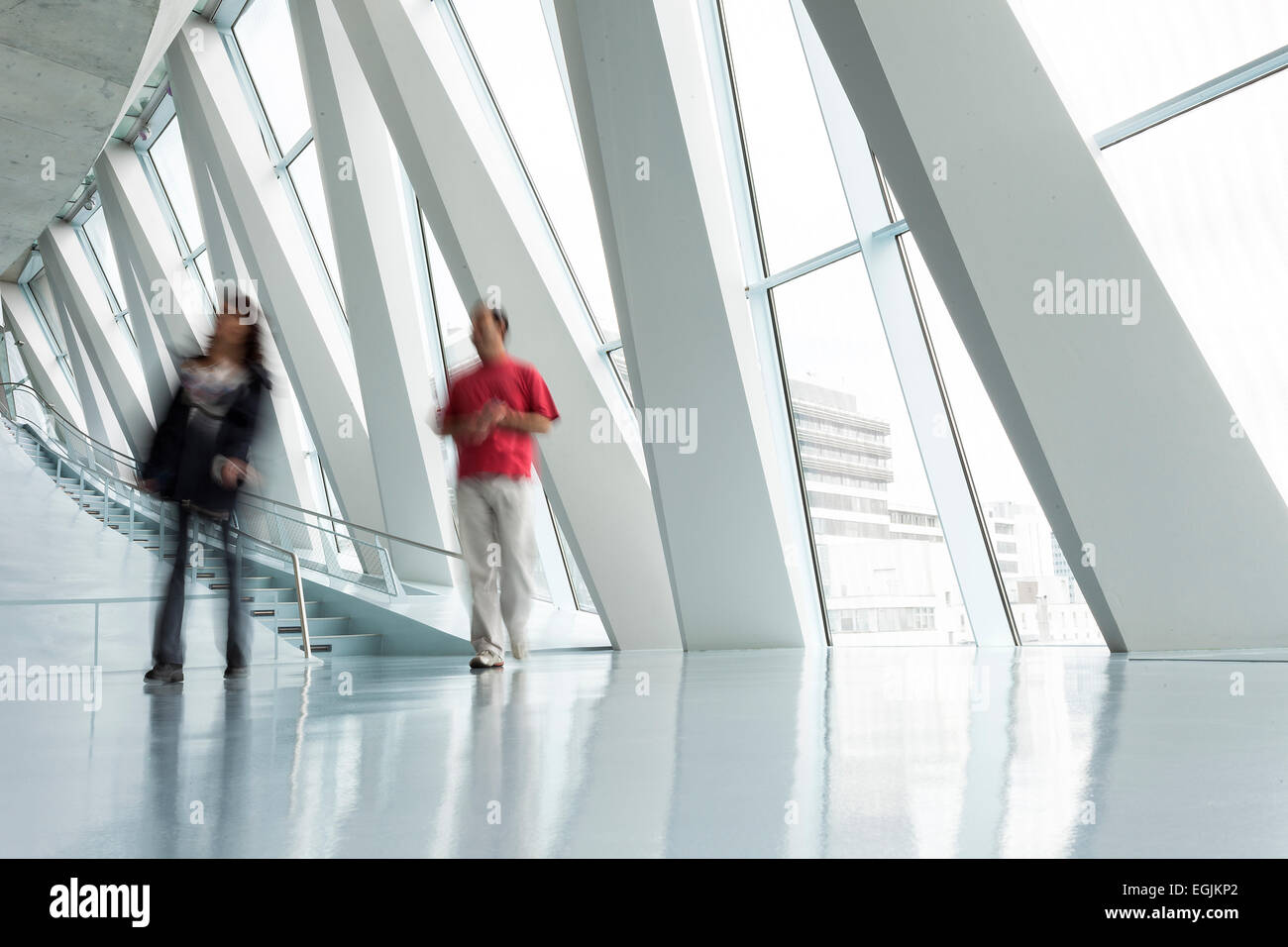 walking people in office building Stock Photo - Alamy