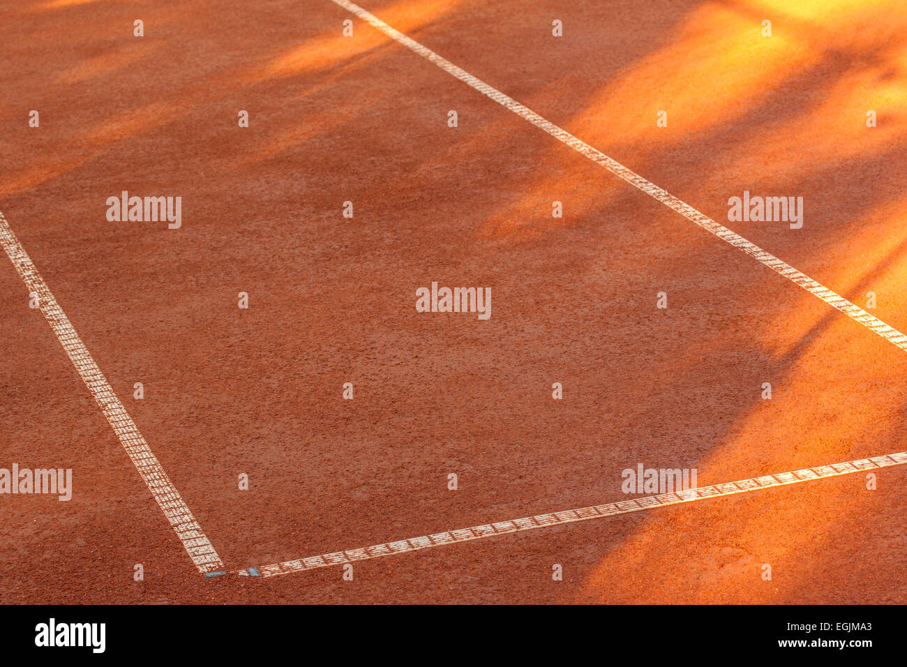 Simple image of a tennis clay court base in clay Stock Photo - Alamy