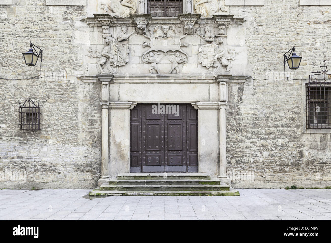 Old door in a historic building, detail of a wooden door in a very old ...