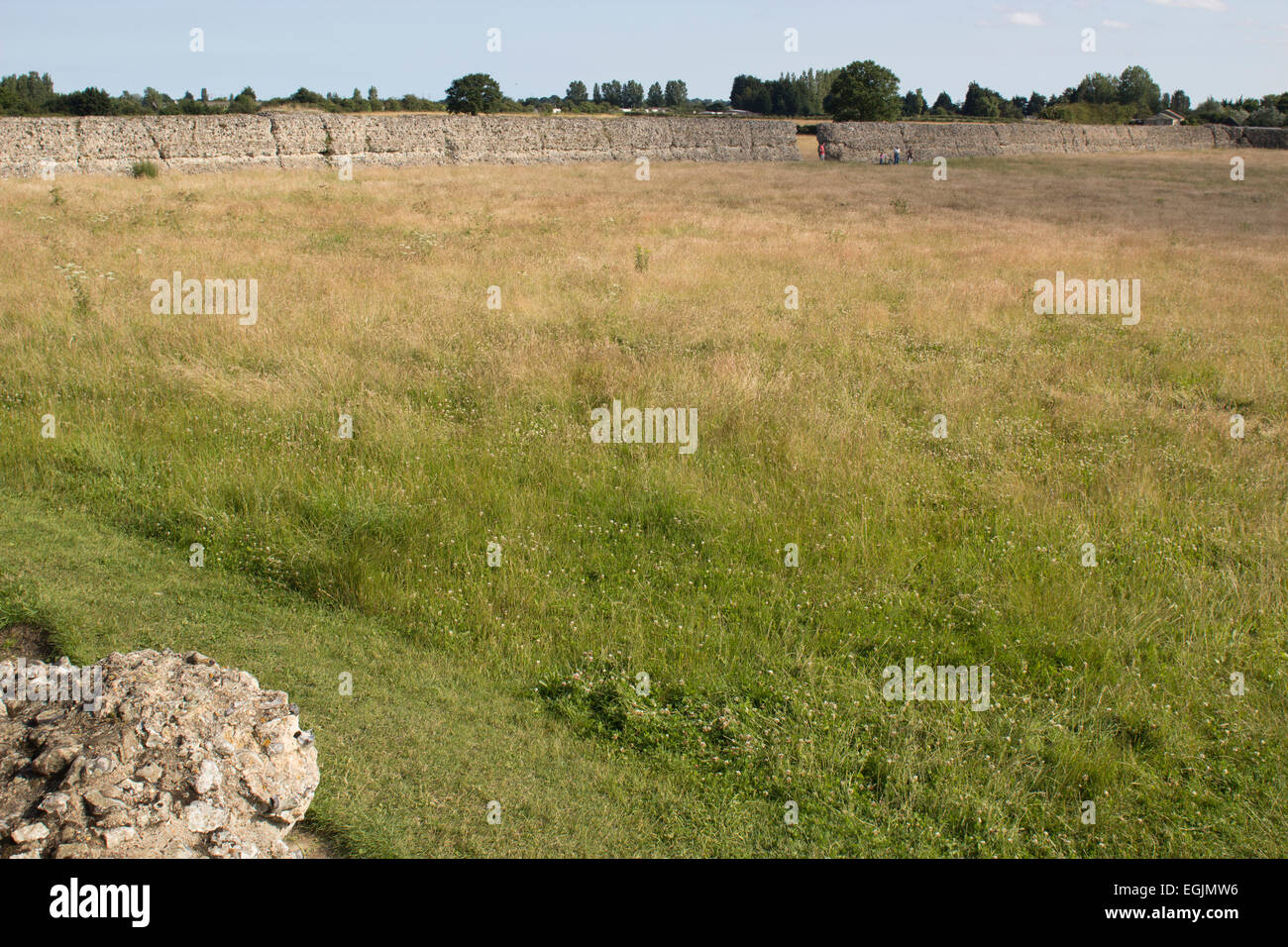 Field and flint wall at Burgh castle Great Yarmouth Stock Photo - Alamy