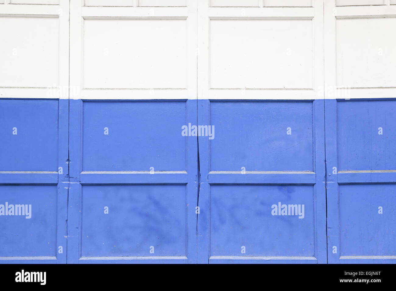 Blue and white door, detail of a door in a city, painting and ...