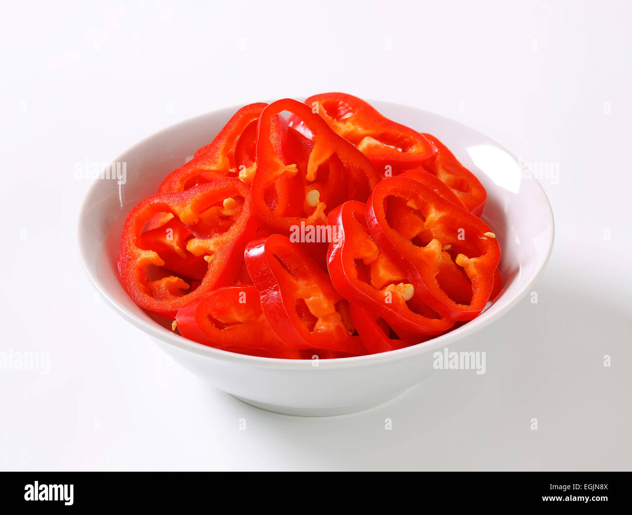 Bowl of sliced red bell pepper Stock Photo - Alamy