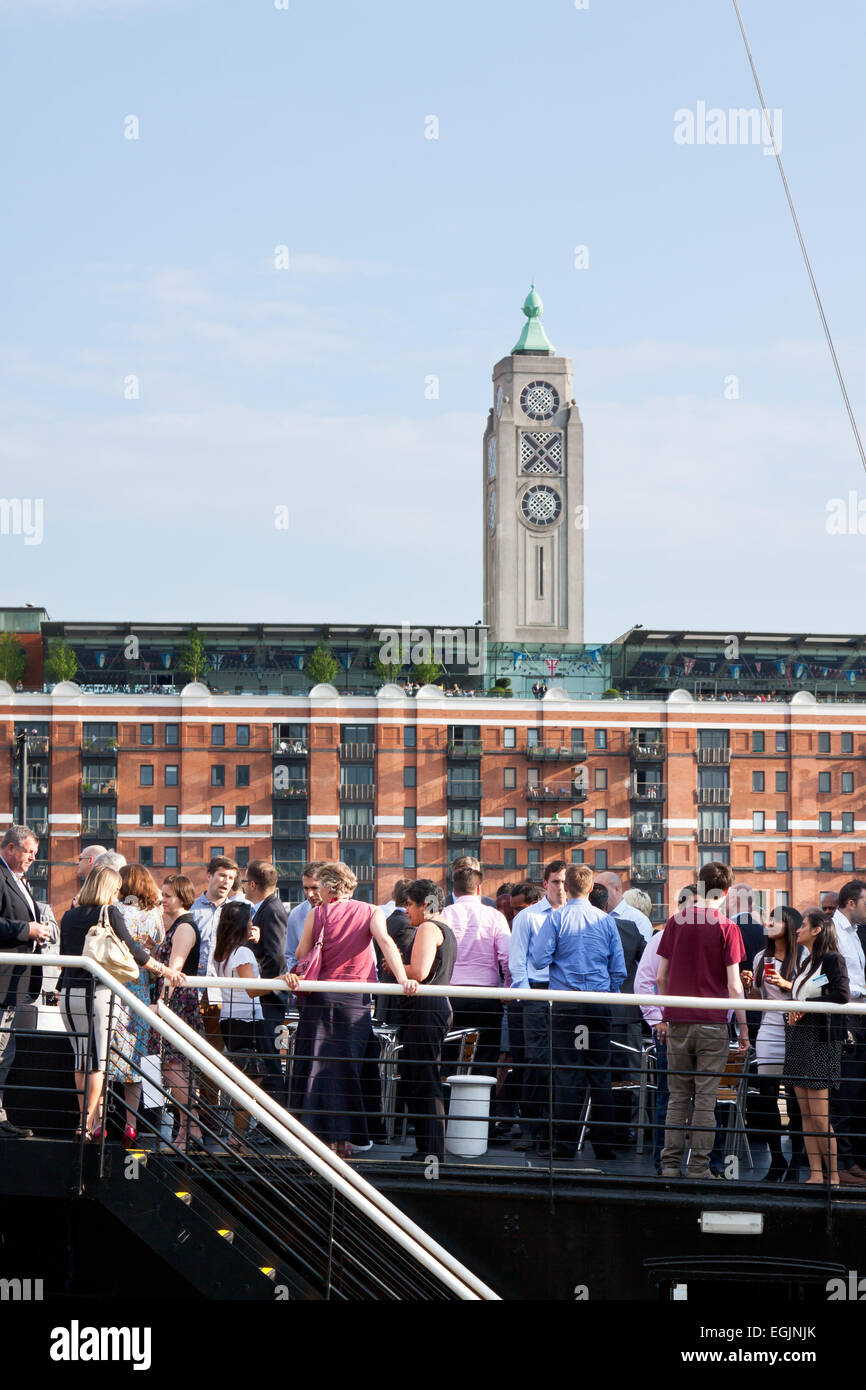 Poeple having a party on HMS President with Oxo Tower behind on the ...