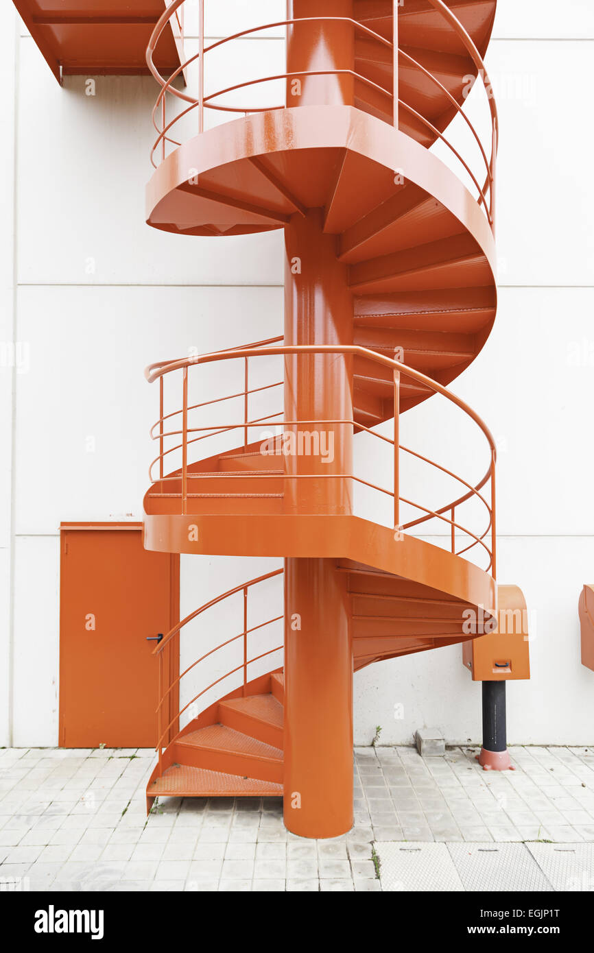Red spiral staircase, detail of an access ladder on the outside, red ...