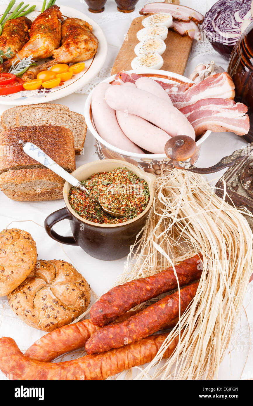 Swedish table of various meal type like polish sausage smoked bacon ...