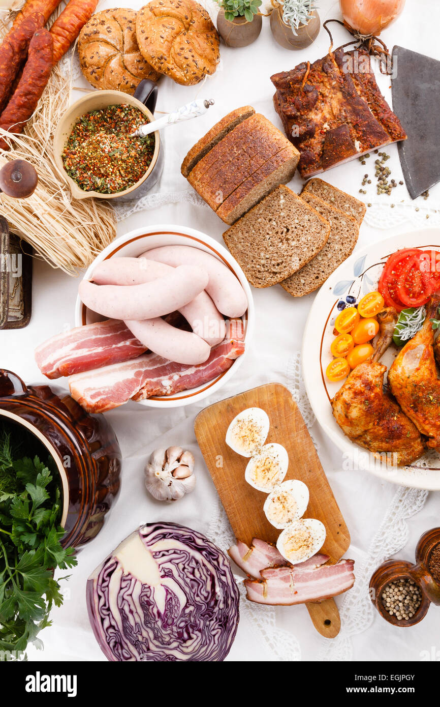 Swedish table of various meal type like polish sausage smoked bacon ...