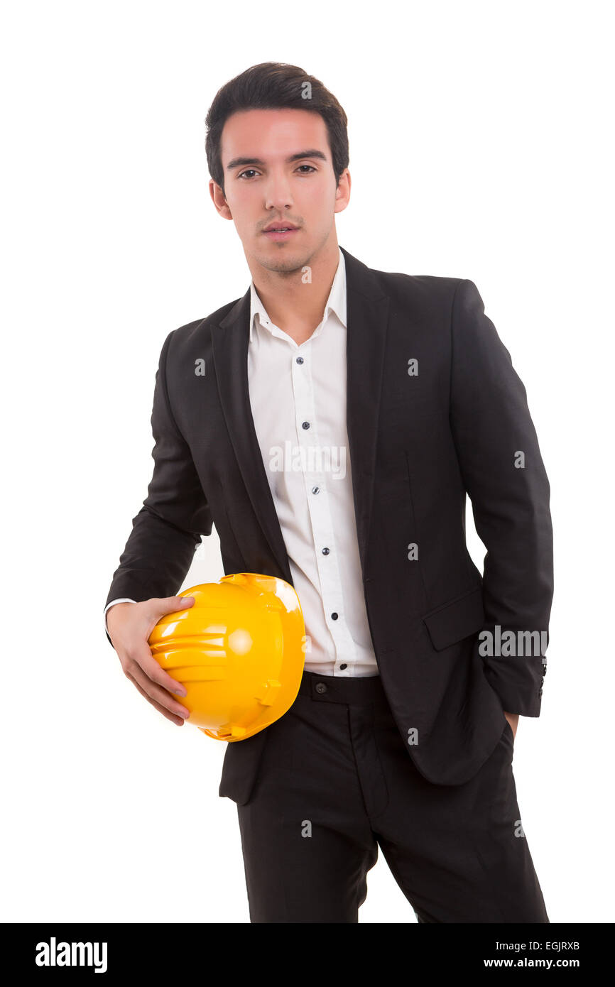 Handsome young engineer posing isolated over white background Stock ...