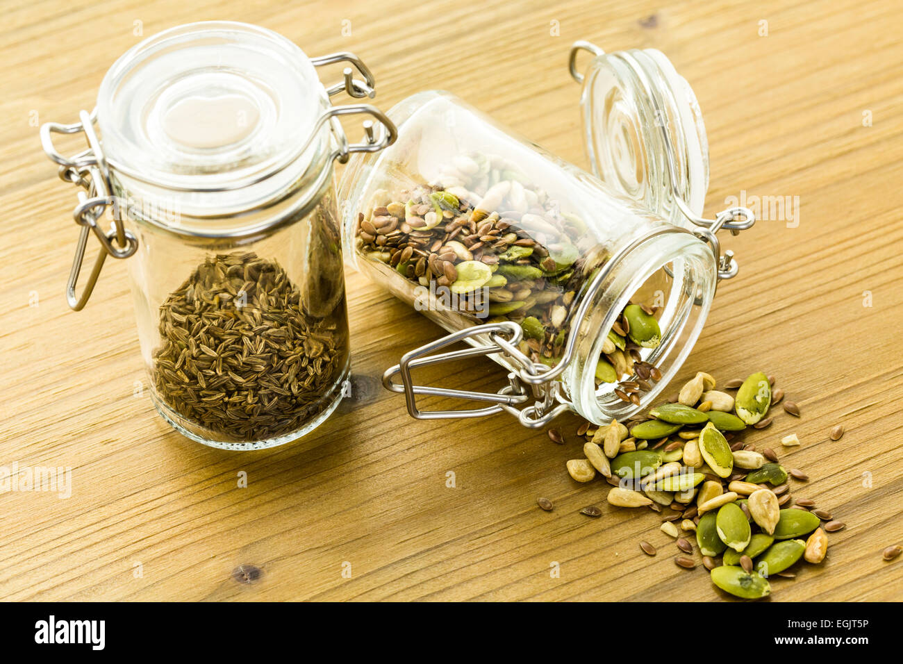 Dry seeds for baking bread in small glass jars Stock Photo - Alamy