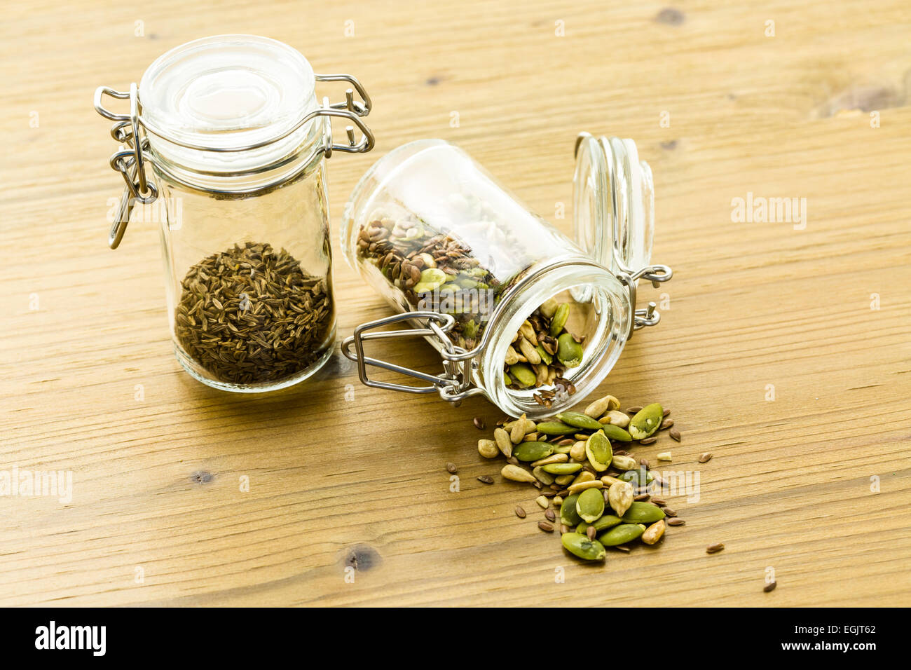 Dry seeds for baking bread in small glass jars Stock Photo - Alamy