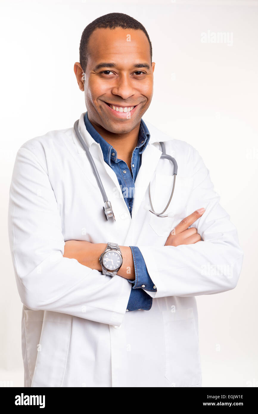 handsome young african doctor posing isolated over a white background ...