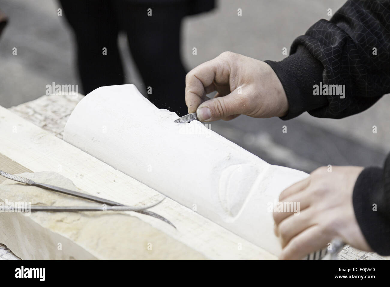 Man carving stone detail of a traditional craftsman working stone ...