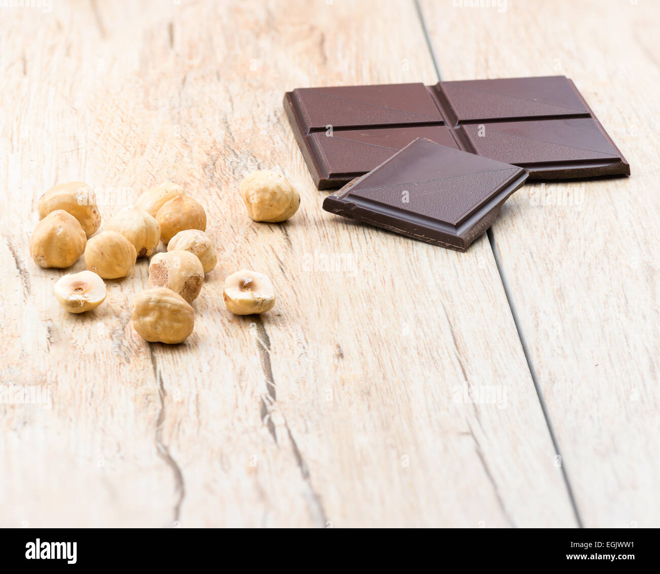 A front view of chocolate and hazelnuts clean Stock Photo - Alamy