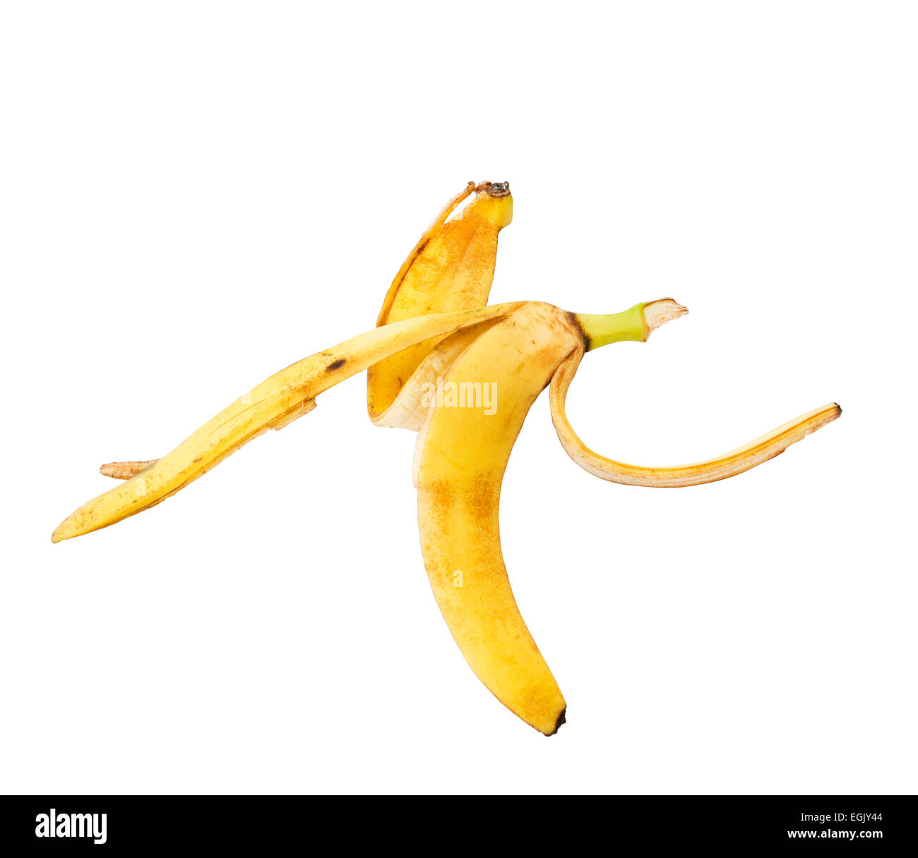 Blotched banana peel over white background Stock Photo - Alamy