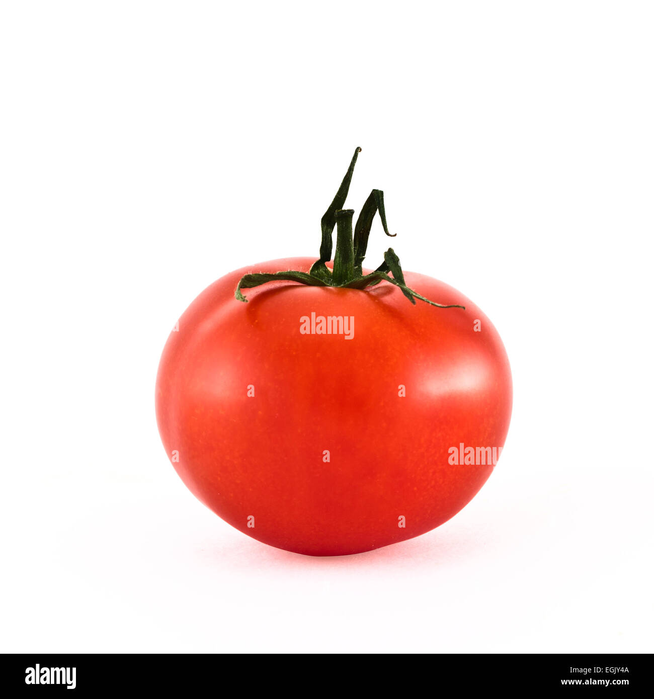Single red tomato isolated over white Stock Photo - Alamy