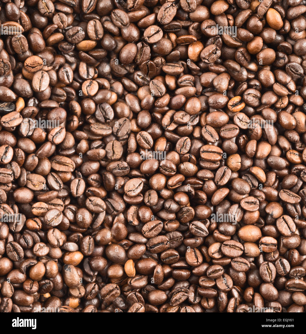 Coffee bean surface as a seamless background Stock Photo - Alamy
