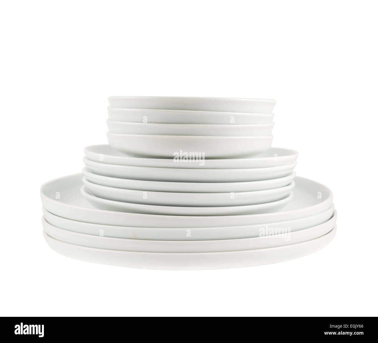 Pile of clean white dish plates isolated Stock Photo - Alamy