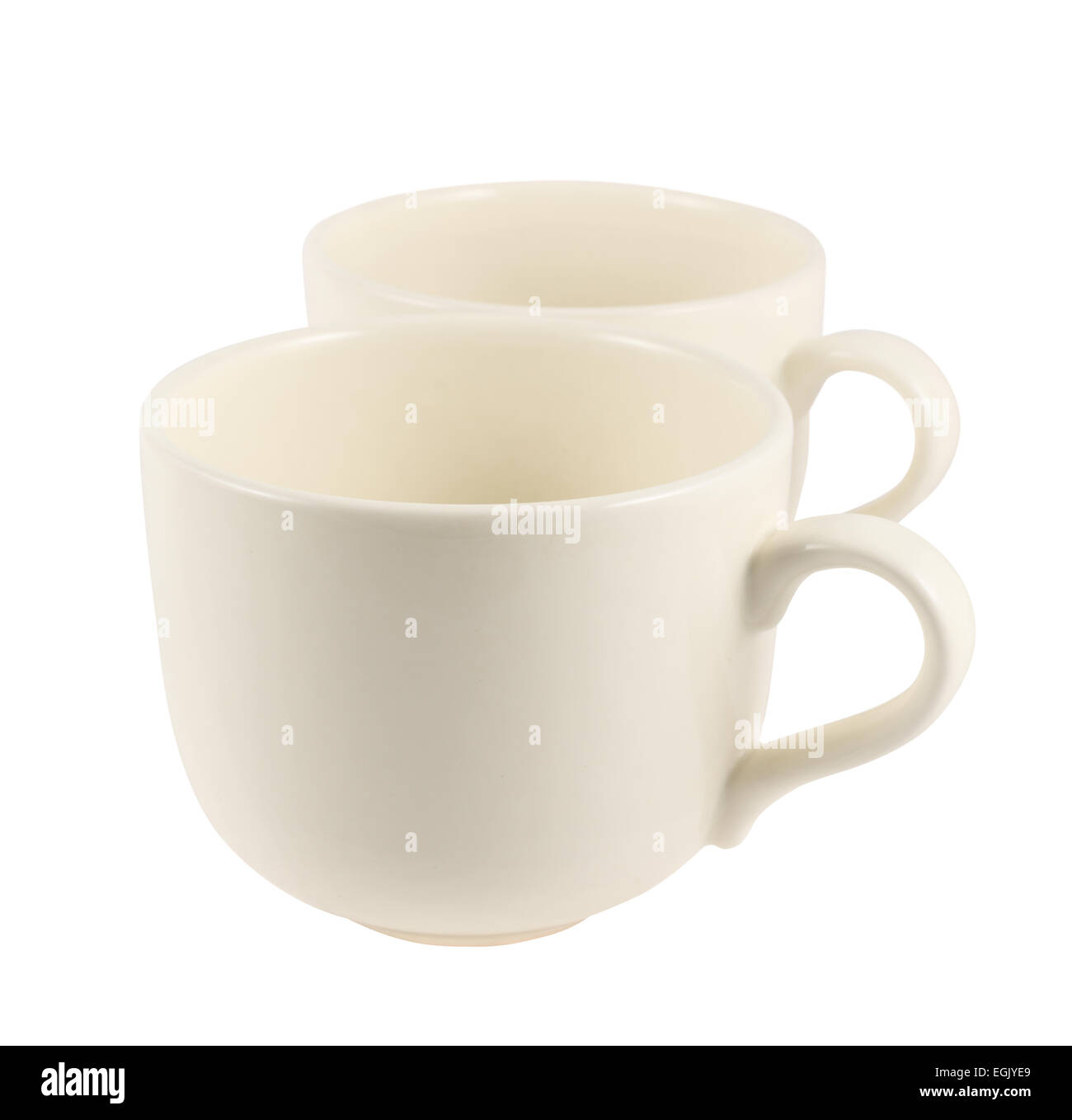 Two ceramic cream colored cups composition Stock Photo - Alamy