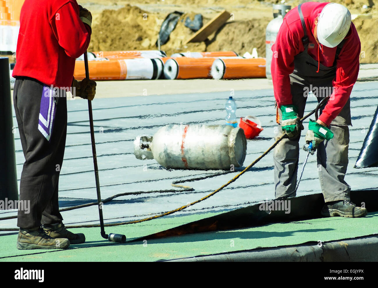 Men are working at the construction site Stock Photo - Alamy