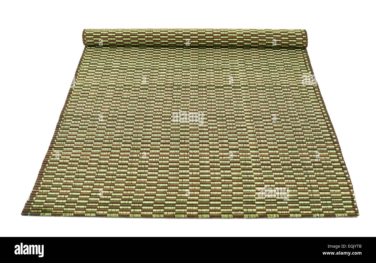 Rolled straw mat isolated Stock Photo - Alamy