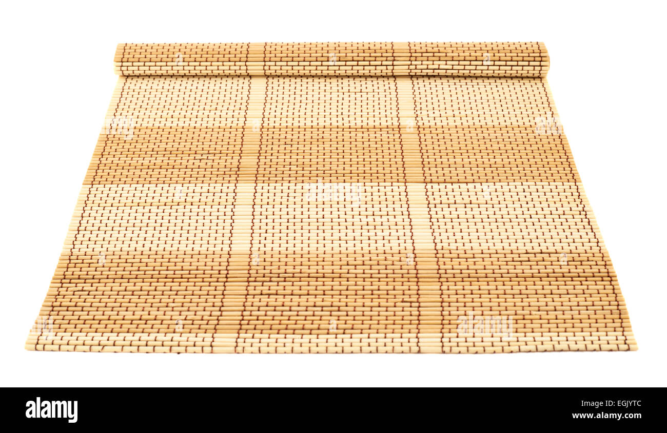 Rolled straw mat isolated Stock Photo - Alamy