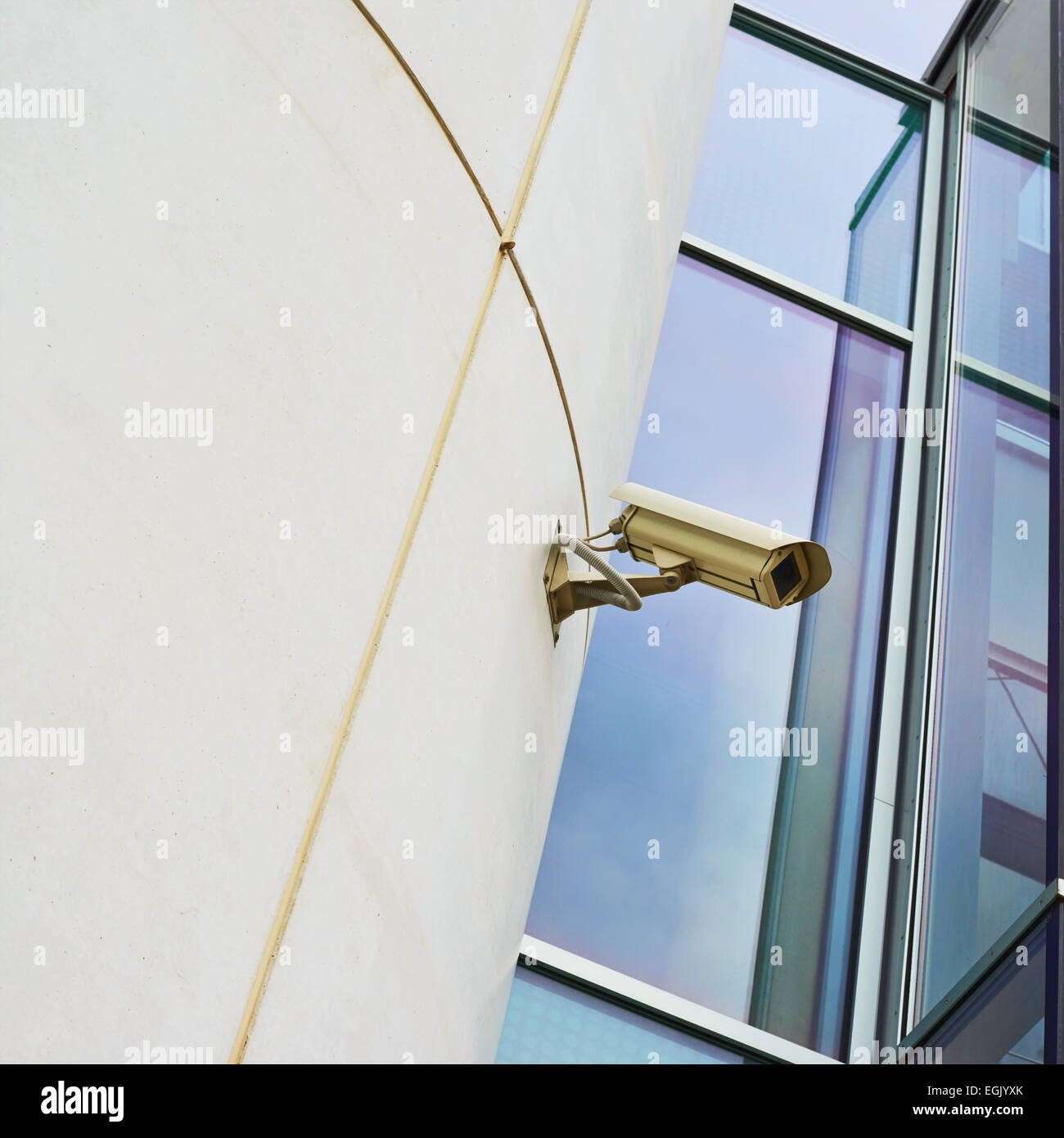 CCTV camera on the wall Stock Photo - Alamy