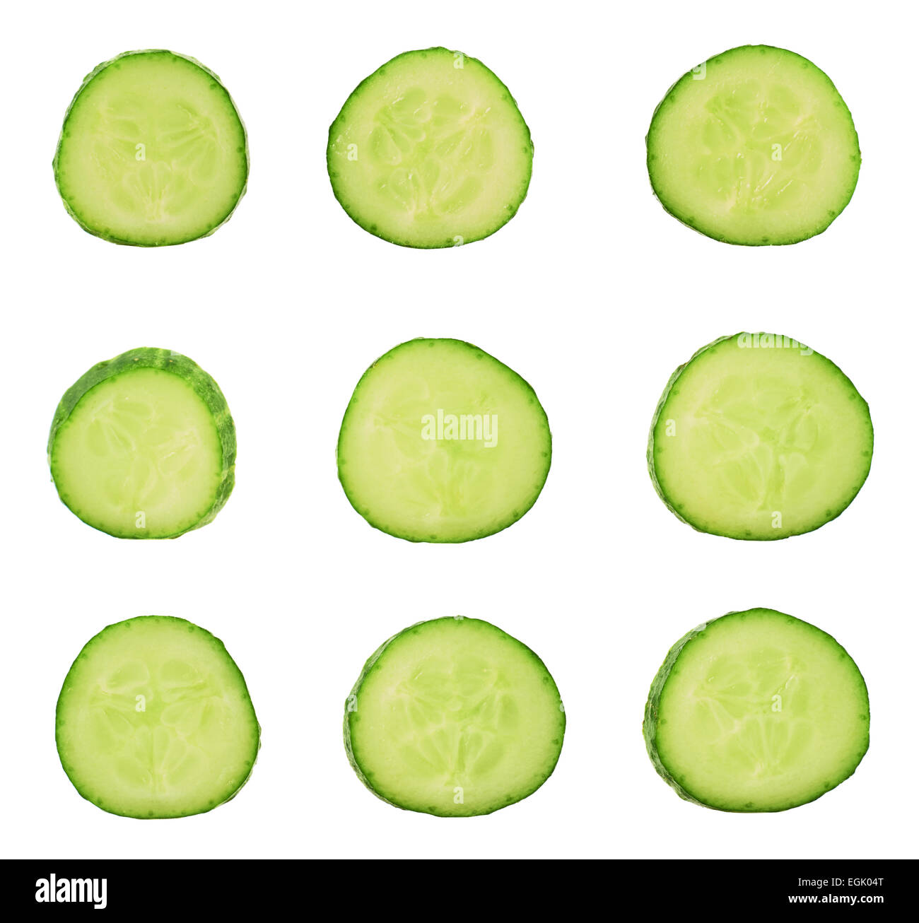 Sliced cucumber pieces isolated Stock Photo - Alamy