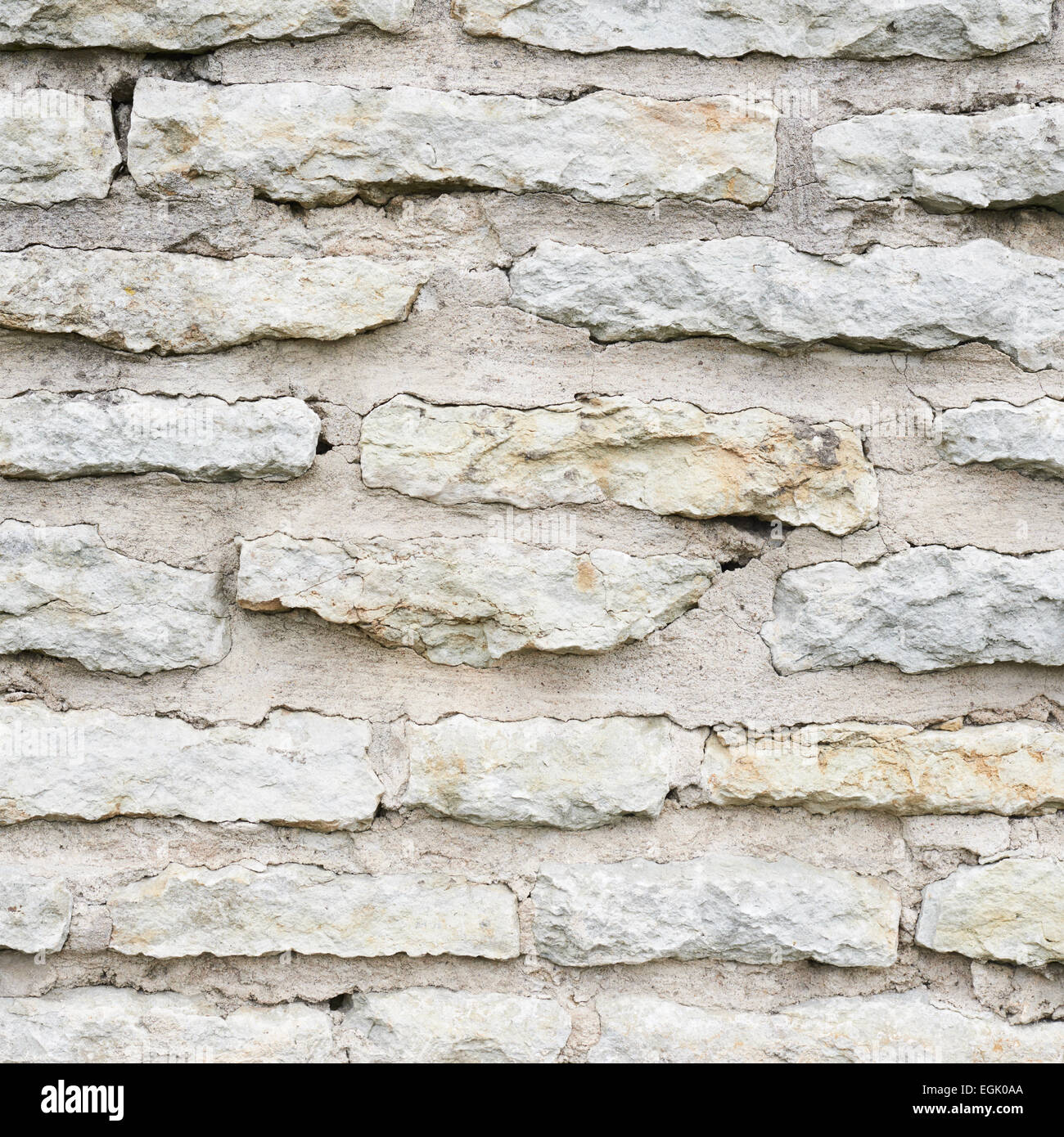 Old limestone brick wall fragment Stock Photo - Alamy