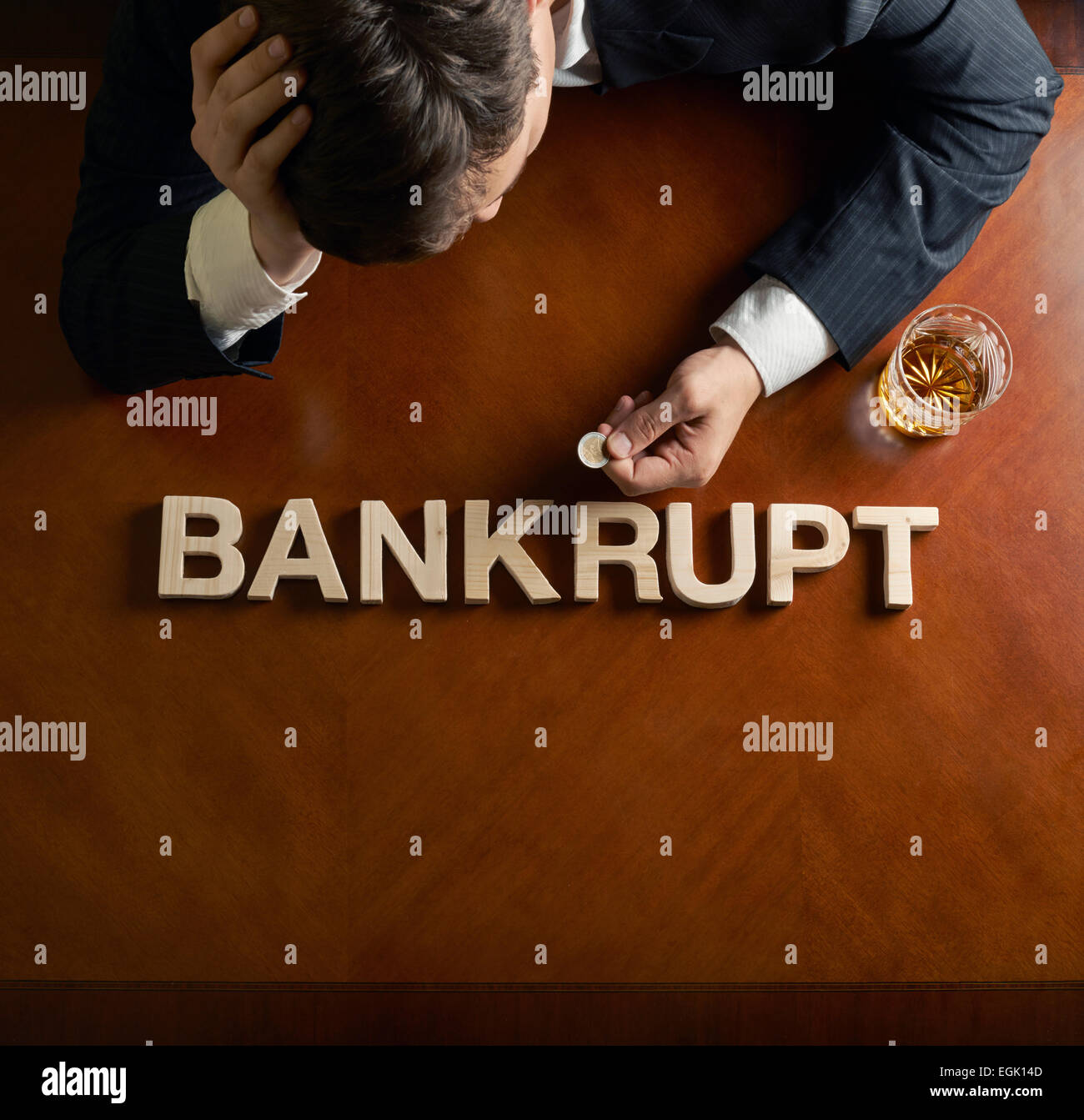 Word Bankrupt and devastated man composition Stock Photo - Alamy