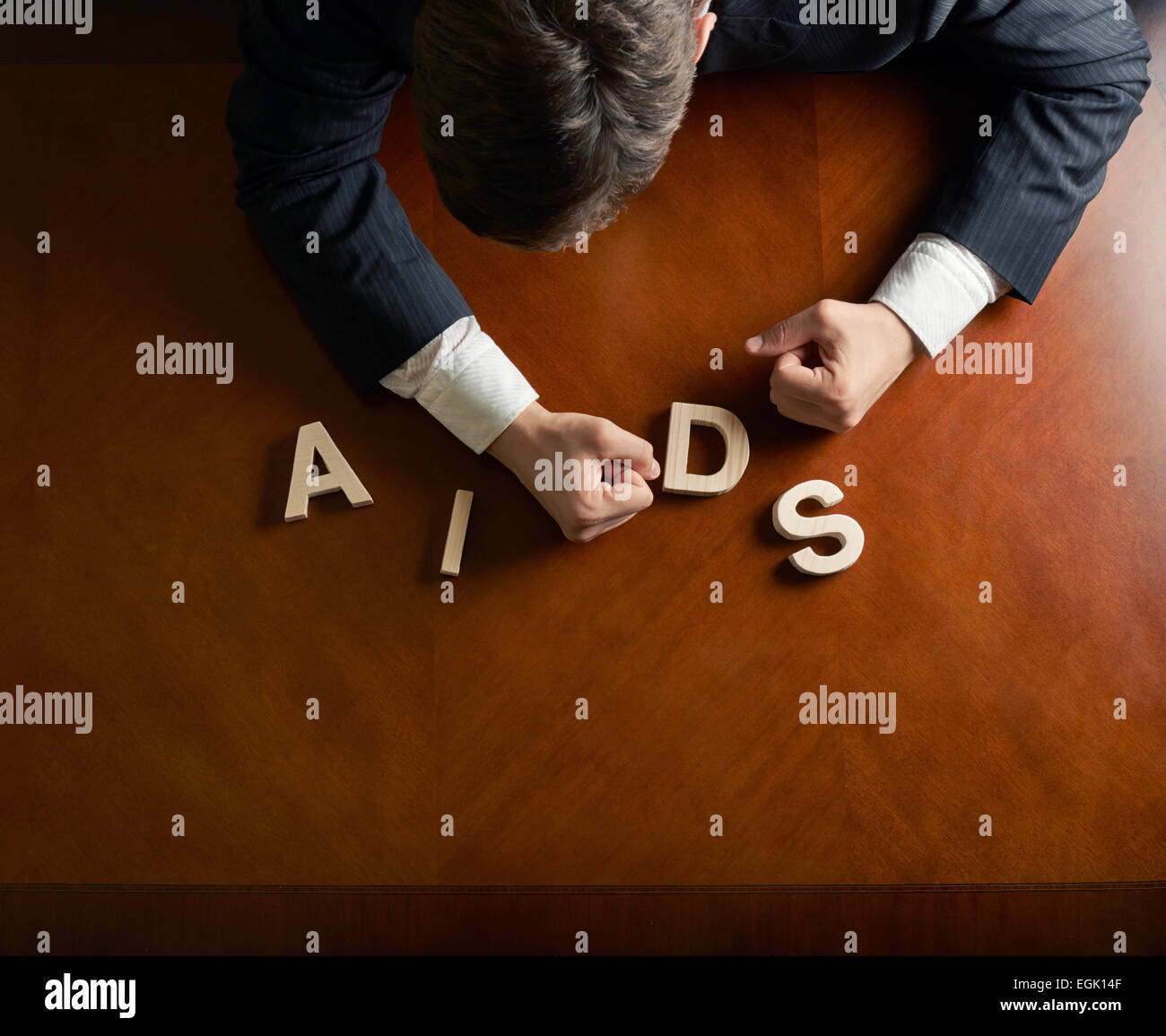 Word AIDS and devastated man composition Stock Photo - Alamy