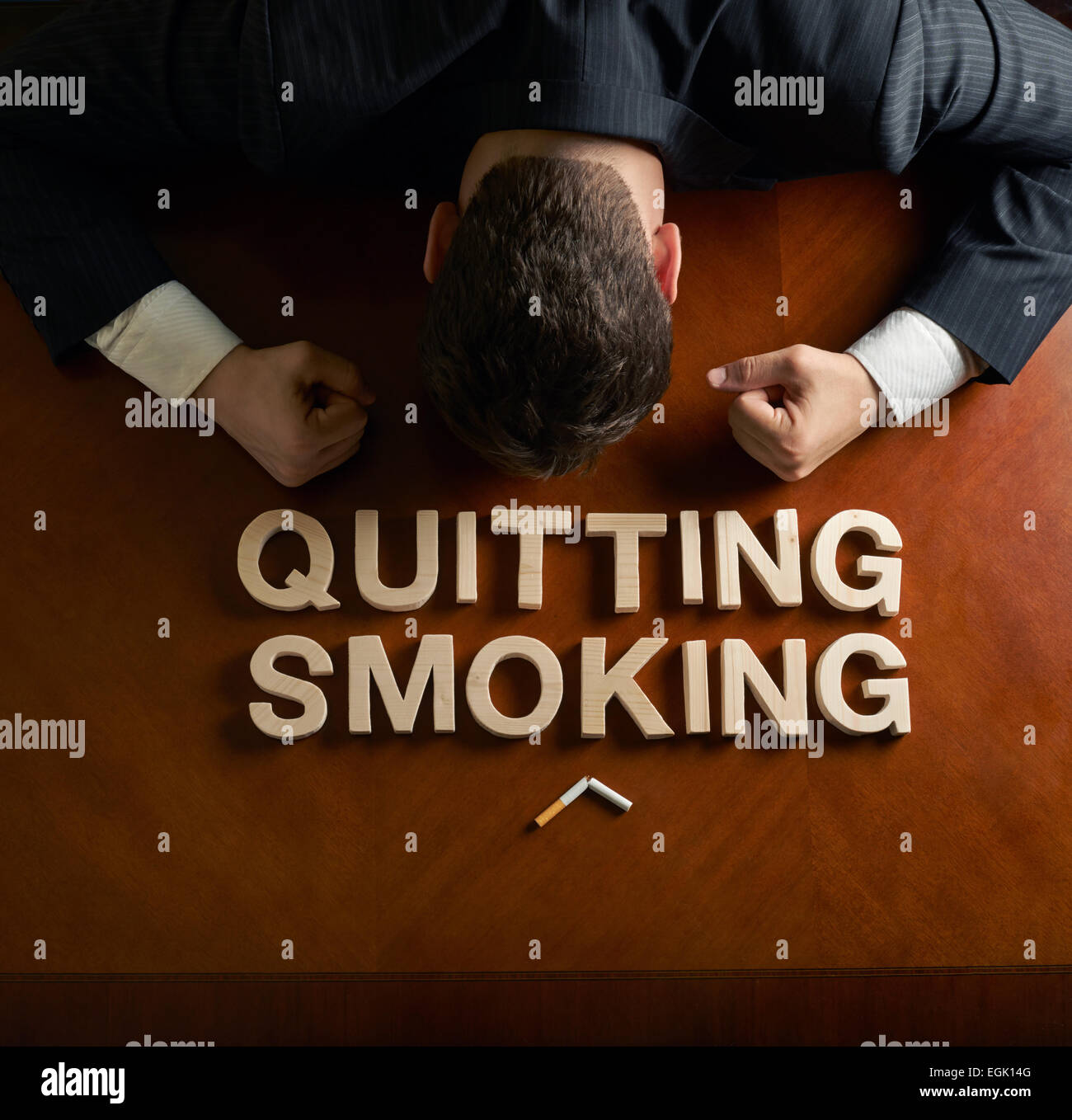 Phrase Quitting Smoking and devastated man composition Stock Photo - Alamy