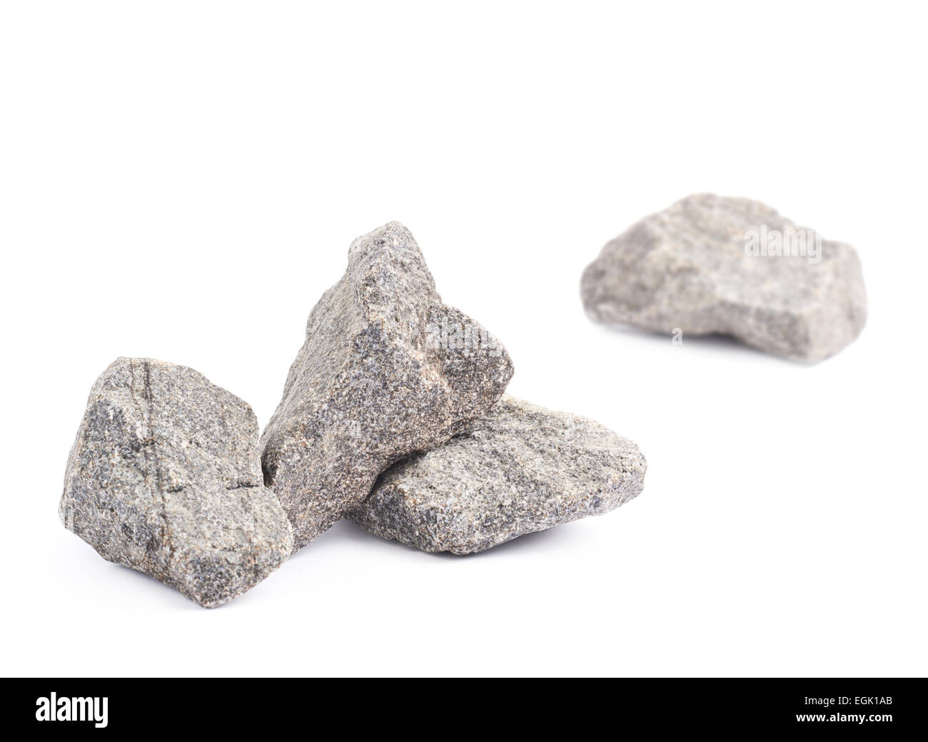 Multiple granite stones in front of single stone Stock Photo - Alamy