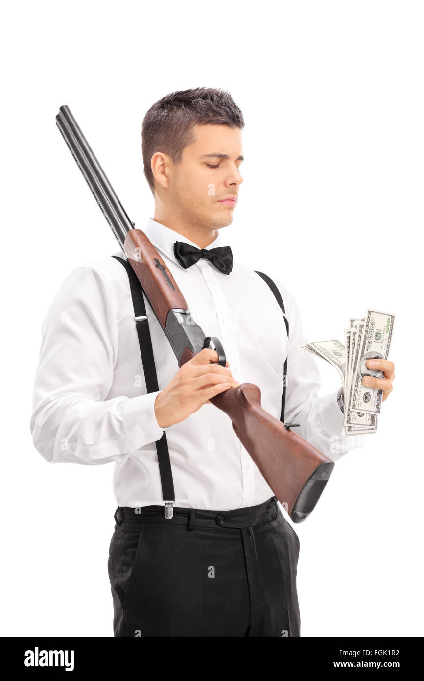 Man with shotgun counting money isolated on white background Stock ...