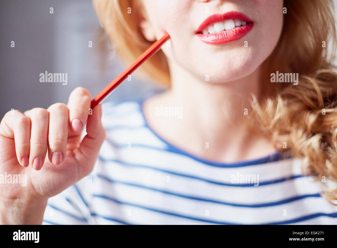 Charming female with pensive expression Stock Photo - Alamy